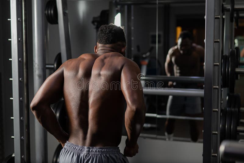 Handsome Afro American Man Posing Showing Back Muscles in Gym. Stock ...