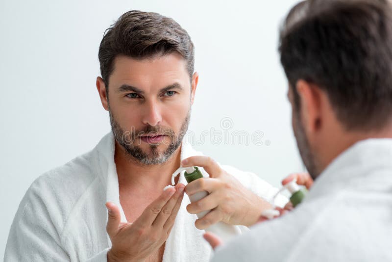Handsome Aged Man Applying Face Cream Beauty Routine Man With Perfect