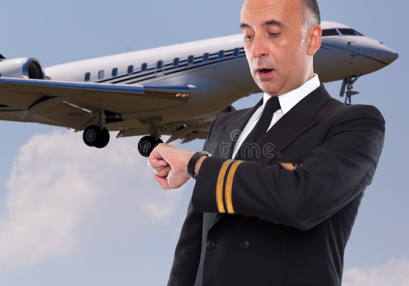 Handsome Airline Worker Looking His Watch Stock Photos - Free & Royalty ...
