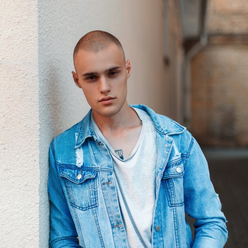 Handsome American Model of a Man in Jeans Clothes on the Street. Stock ...