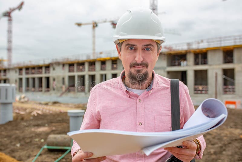 Handsome Architect or Supervisor Standing Outdoors on a Building Site ...
