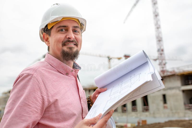 Handsome Architect or Supervisor Standing Outdoors on a Building Site ...