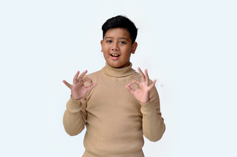 Handsome Asian Boy with Smile and Ok Expression. Stock Image - Image of ...