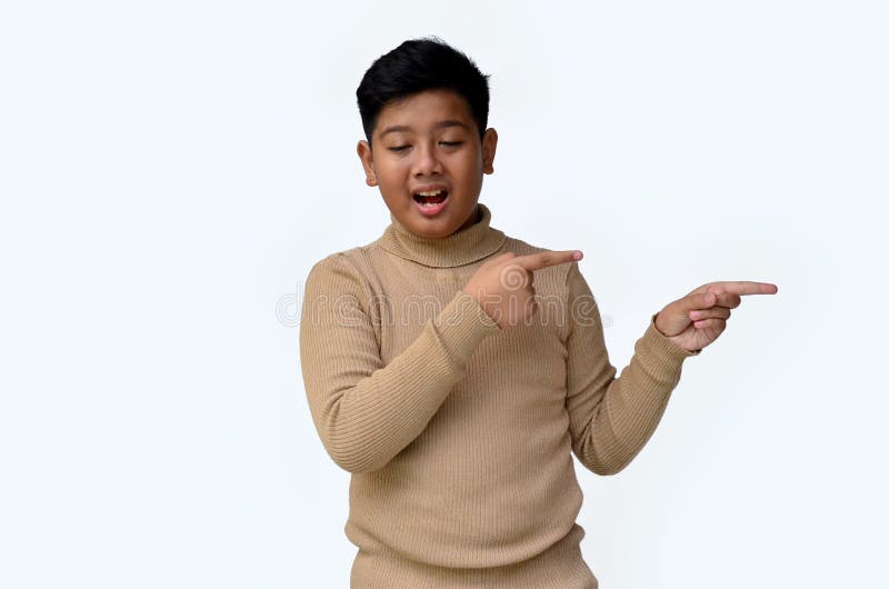 Handsome Asian Boy with Pointing Expression Stock Photo - Image of ...