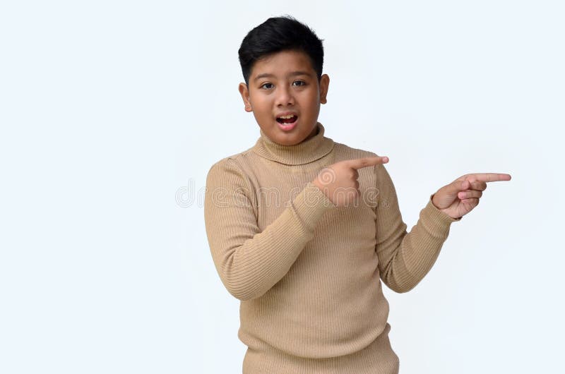 Handsome Asian Boy with Pointing Expression Stock Photo - Image of ...