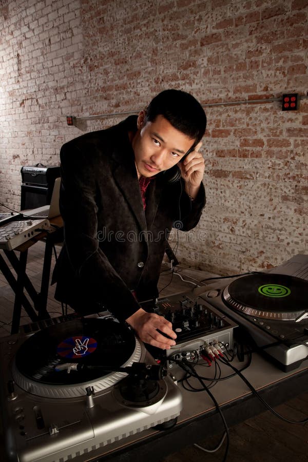 Handsome Asian DJ stock image. Image of electronic, basement - 13856815