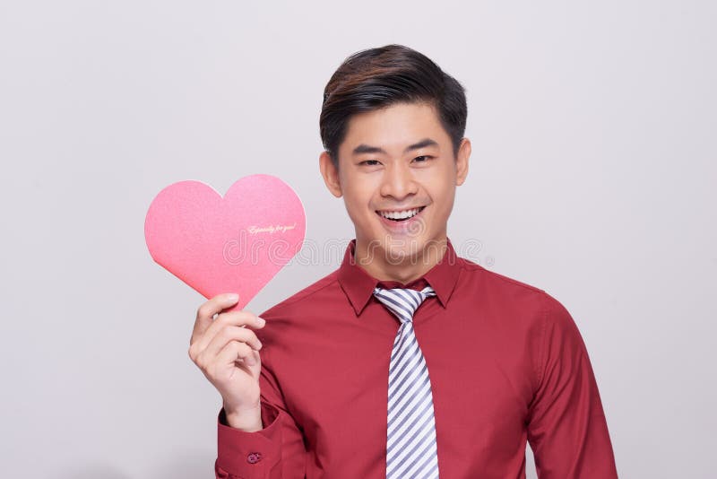Handsome Asian Man Holding a Cardboard Paper Heart Stock Photo - Image ...