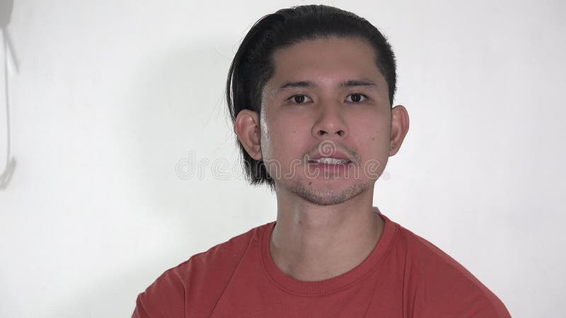 Handsome Asian Man Turns and Smiles Stock Footage - Video of looking ...