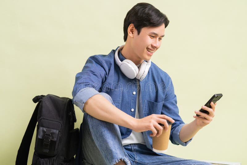 Handsome Asian Student Boy Sitting Using Smart Phone Stock Photo ...