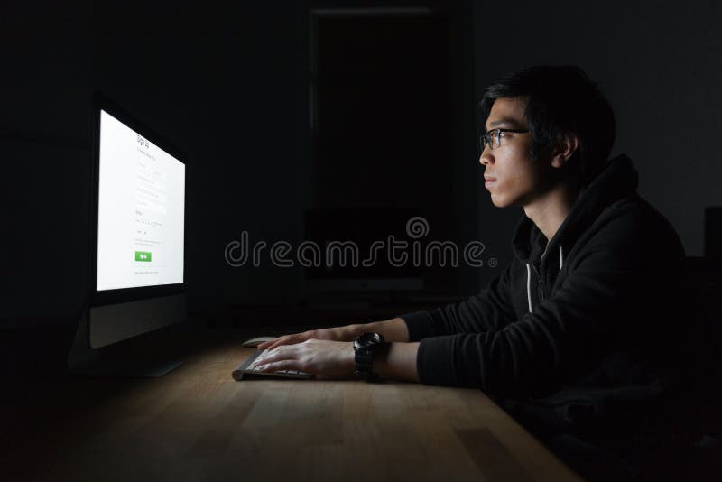 Handsome Asian Young Man Using Computer in Dark Room Stock Image ...