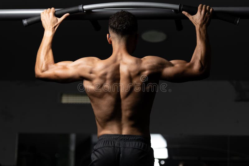 Bodybuilder Exercising Back in Gym Stock Photo - Image of exercising ...
