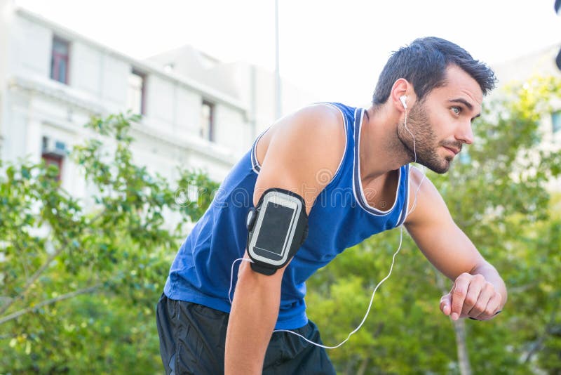Handsome Athlete Preparing To Exercise Stock Photo - Image of health ...