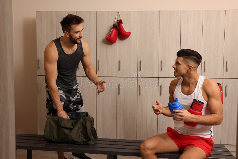 Handsome Athletic Men Talking in Locker Room Stock Photo - Image of ...