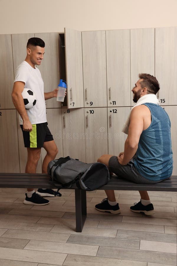 Handsome Athletic Men Talking in Locker Room Stock Photo - Image of ...