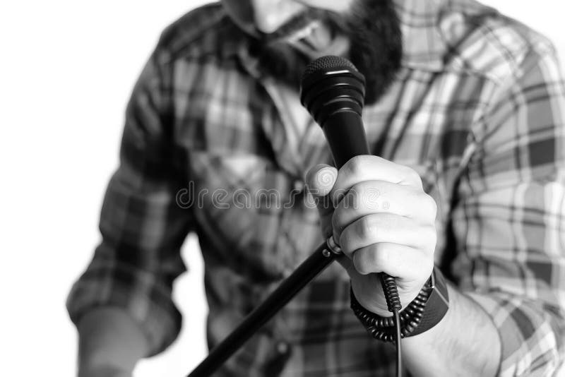 Man Singing Pose Holding Microphone Stock Photos - Free & Royalty-Free ...