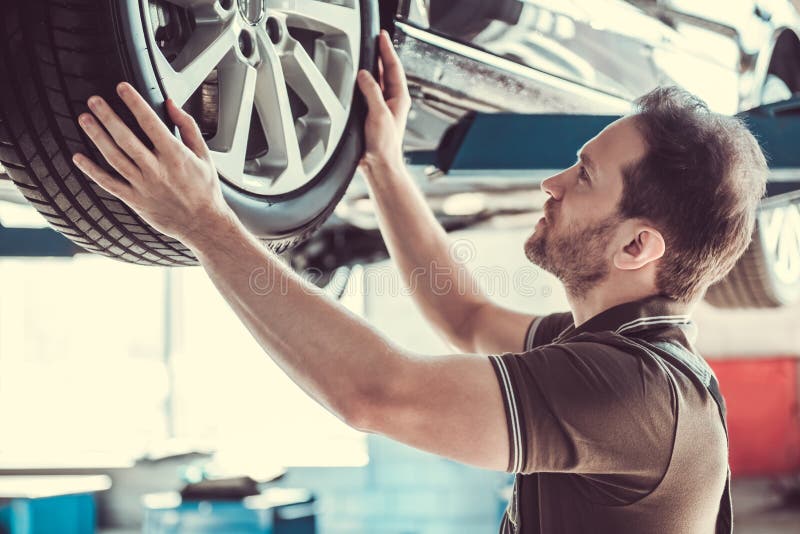 Handsome Auto Service Worker Stock Image - Image of shop, center: 90925731