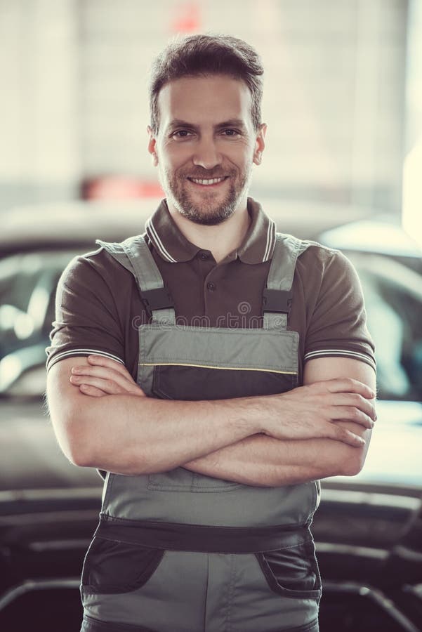 Handsome Auto Service Worker Stock Image - Image of garage, shop: 90924719