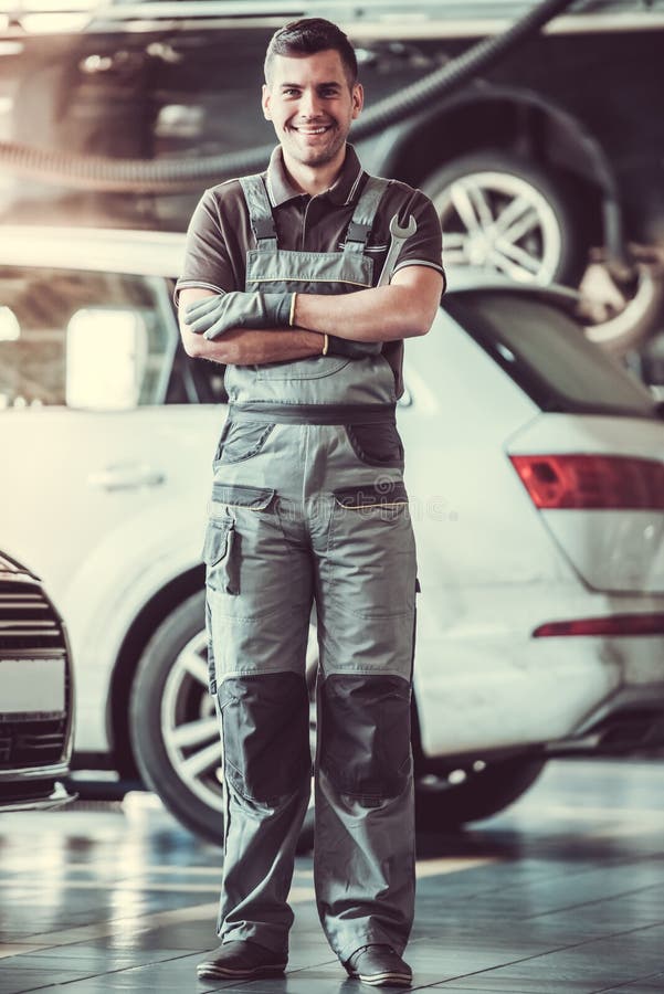 Handsome Auto Service Worker Stock Photo - Image of safety, people ...