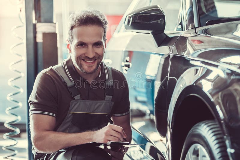 Handsome Auto Service Worker Stock Image - Image of repair, manager ...
