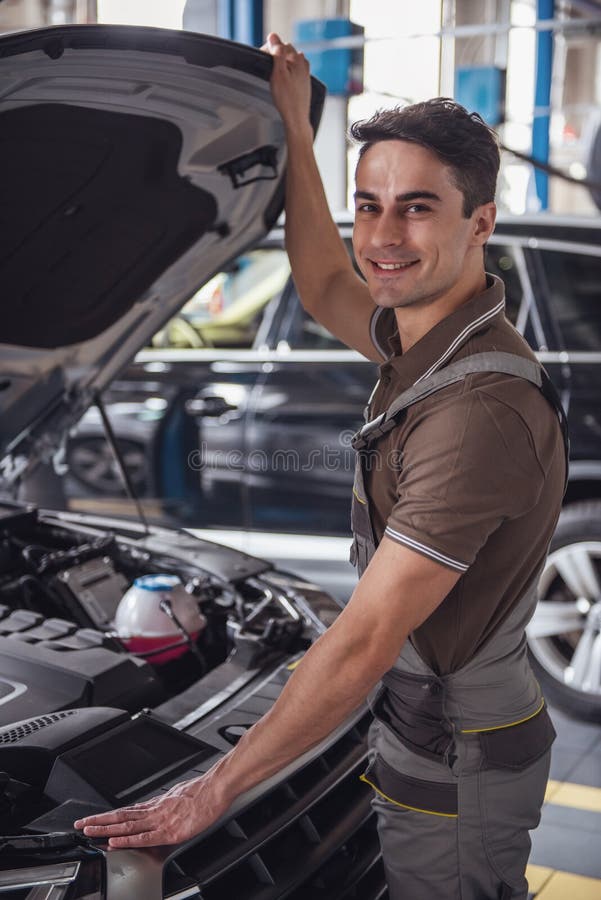 Handsome Auto Service Worker Stock Image - Image of professional, motor ...