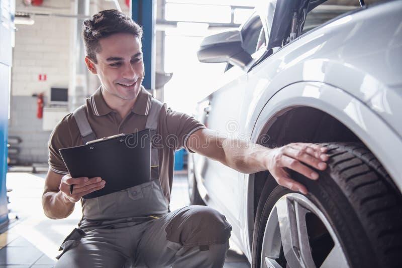 Handsome Auto Service Worker Stock Image - Image of manager, notes ...