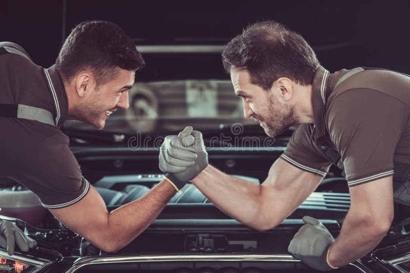 Handsome Auto Service Workers Stock Photo - Image of center, shop: 90925396