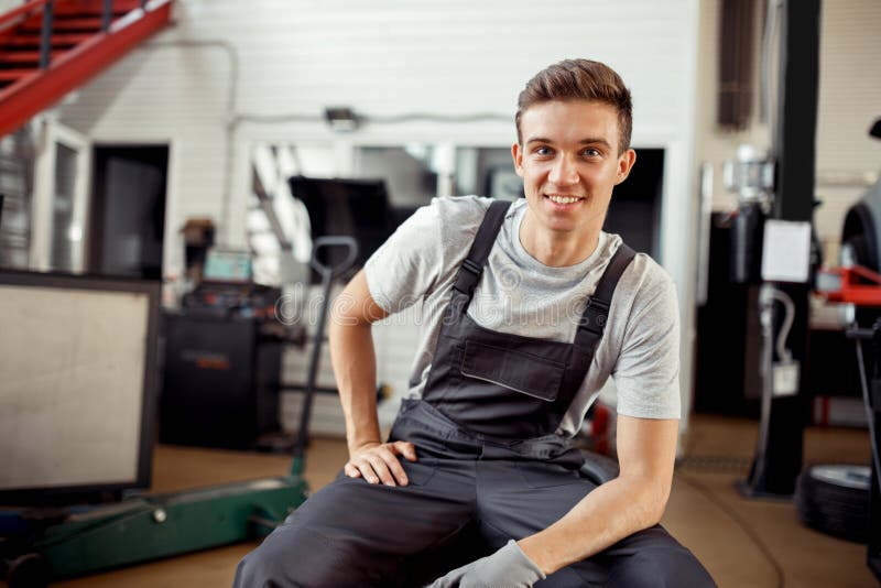 A Handsome Automechanic is at His Work during a Short Break Stock Image ...