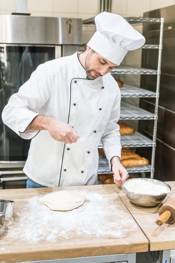 Handsome Baker Working with Industrial Dough Roller Stock Photo - Image ...