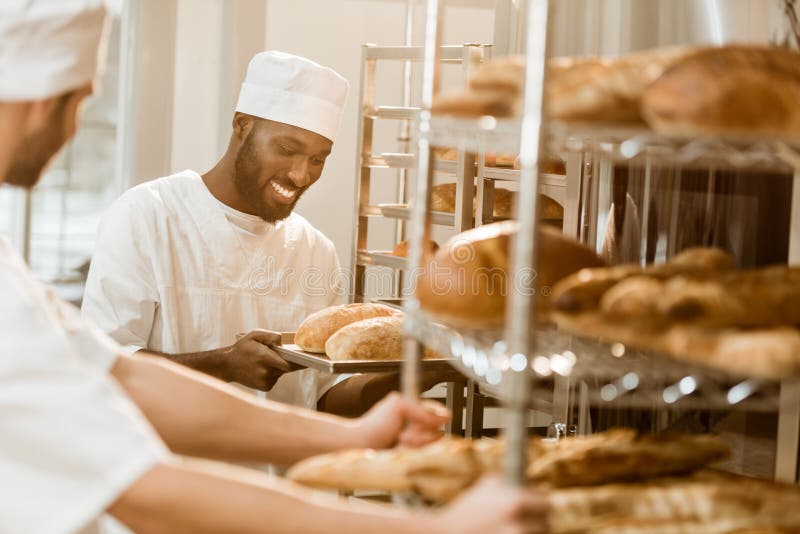 Handsome Bakers Working Together Stock Photo - Image of manufacture ...
