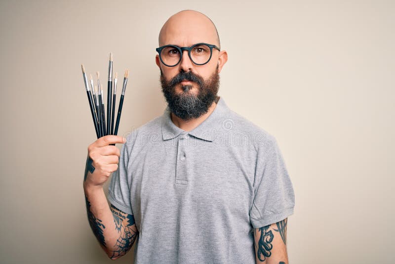 Handsome Bald Artist Man with Beard and Tattoo Painting Using Painter ...