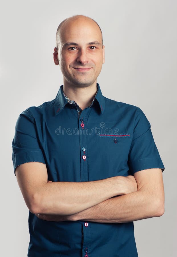 Handsome bald man smiling stock image. Image of looking - 73221221