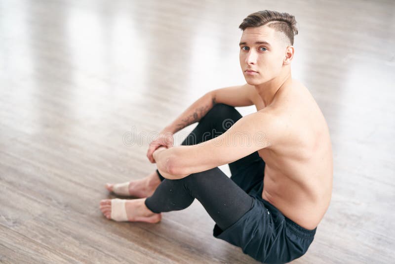 Handsome Ballet Dancer Sitting on the Floor and Resting Stock Image ...