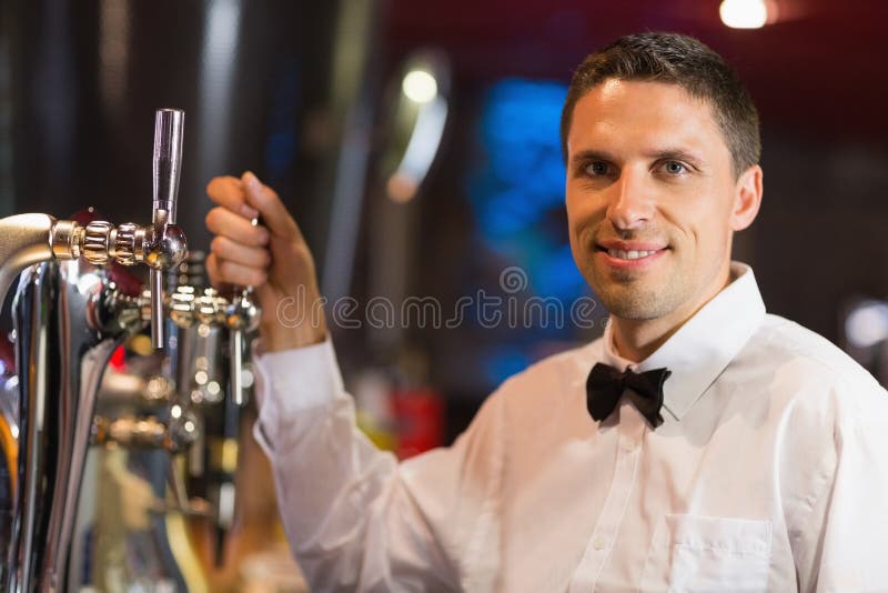 Handsome Barman Smiling at Camera Stock Photo - Image of pint ...