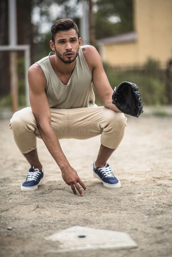Handsome Baseball Player Ready To Catch Ball on Court Stock Photo ...