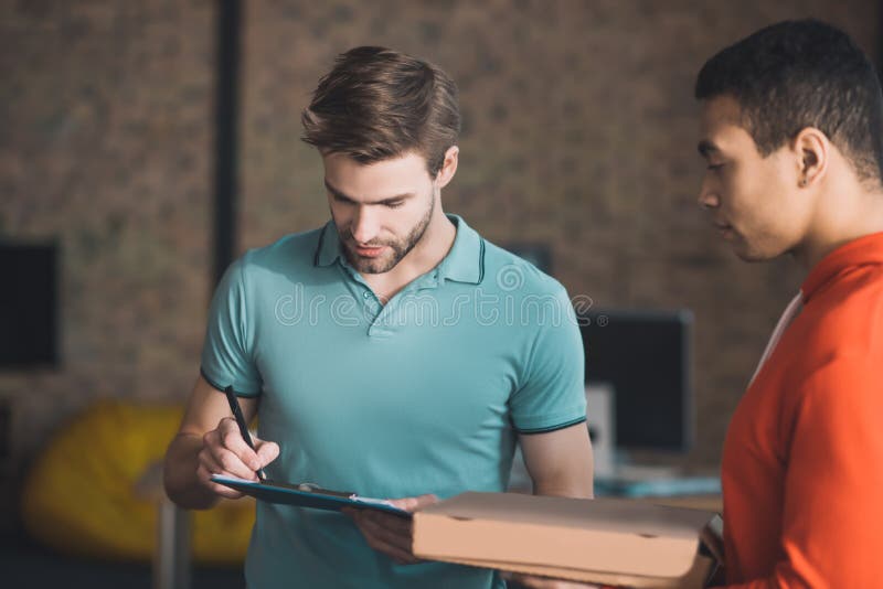 Handsome Beaded Man Looking at the Invoice Stock Image - Image of order ...