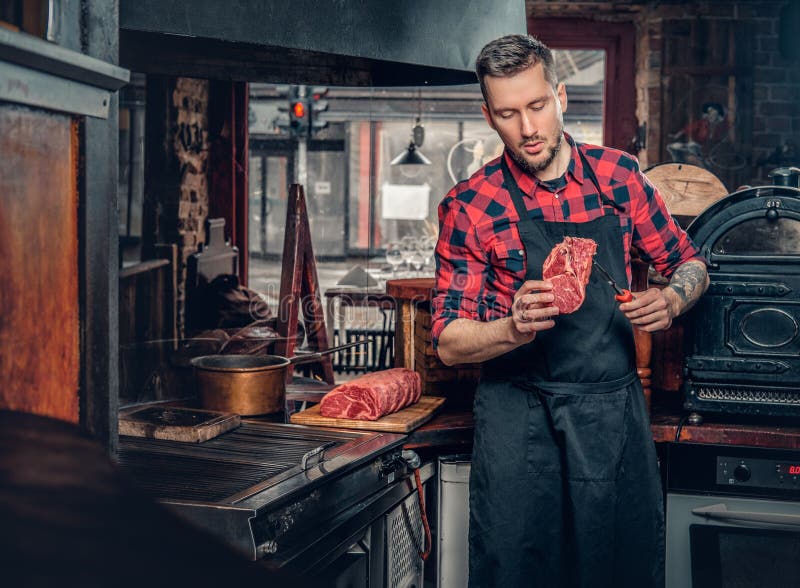 A Man Holds Beef Steak on a Kitchen. Stock Photo - Image of fresh ...