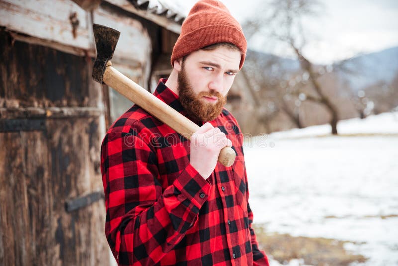 Handsome Pensive Man with Axe Standing in Mountain Winter Forest Stock ...