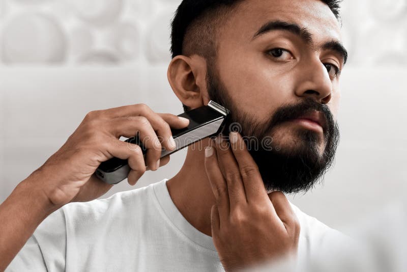 Handsome Bearded Man Shaving His Beard Stock Photo - Image of ...