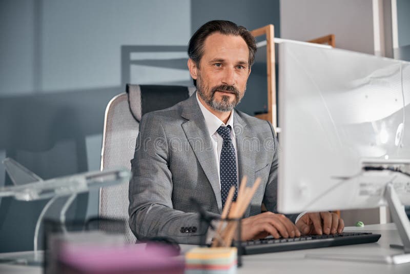 Handsome Bearded Man Using Computer at Work Stock Image - Image of ...