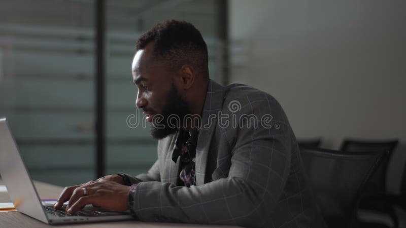 Handsome Black Male Programmer Developer Coding Software On Laptop Computer Typing On Keyboard