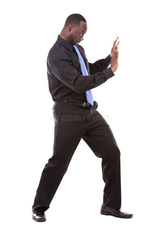 Man pushing an object stock photo. Image of portrait - 26957166