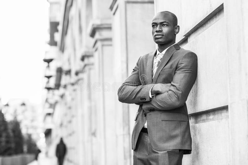 Handsome Black Man Wearing Suit in Urban Background Stock Image - Image ...