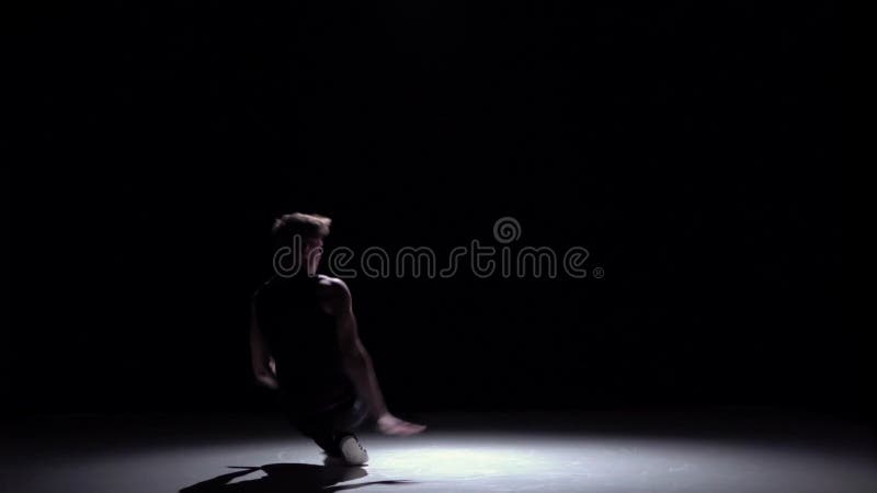 Handsome Breakdance Style Dancer Goes on Dance, on Black, Shadow, Slow ...