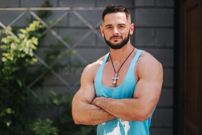 Handsome Bodybuilder in Blue Singlet Posing Outside. Bearden Men before ...