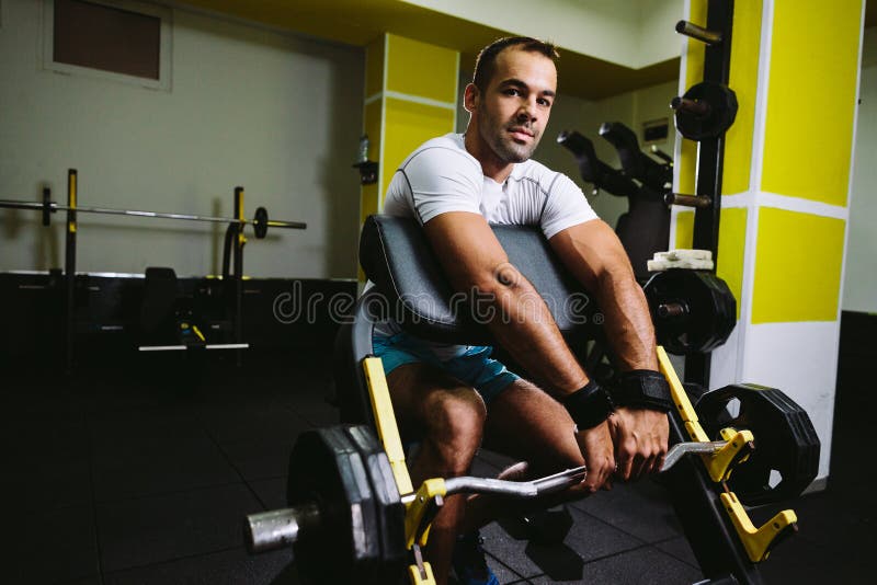 Handsome Bodybuilder Pumping Up Hands in Gym Stock Photo - Image of ...