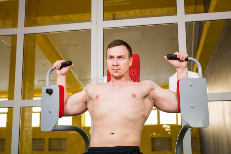 Handsome Bodybuilder Works Out Excercise in Gym Stock Photo - Image of ...