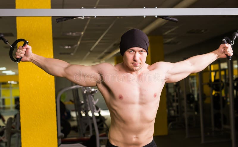 Handsome Bodybuilder Works Out Excercise in Gym Stock Photo - Image of ...