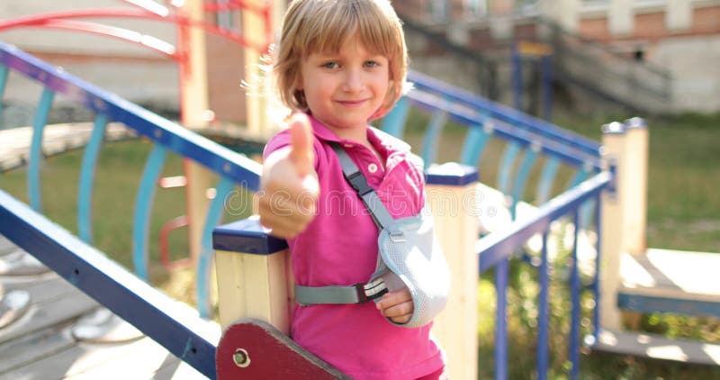 A Handsome Boy with a Broken Arm in a Bandage. Stock Footage - Video of broken, bone: 298645856