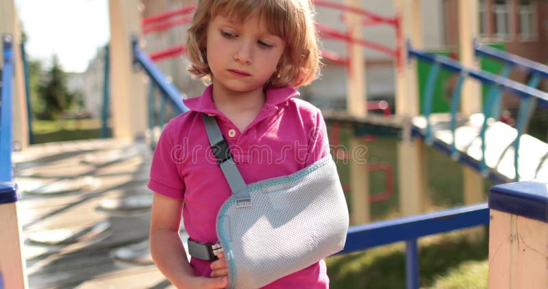 A Handsome Boy with a Broken Arm in a Bandage. Stock Footage - Video of broken, bone: 298645856