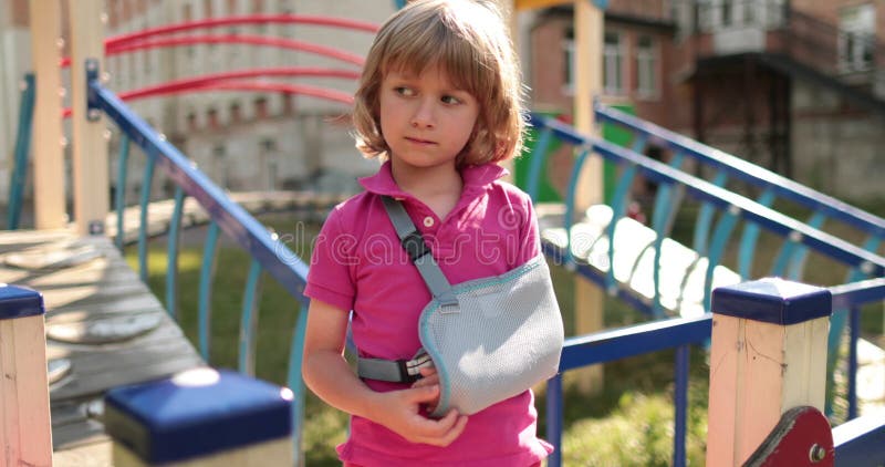 A Handsome Boy with a Broken Arm in a Bandage. Stock Footage - Video of broken, bone: 298645856